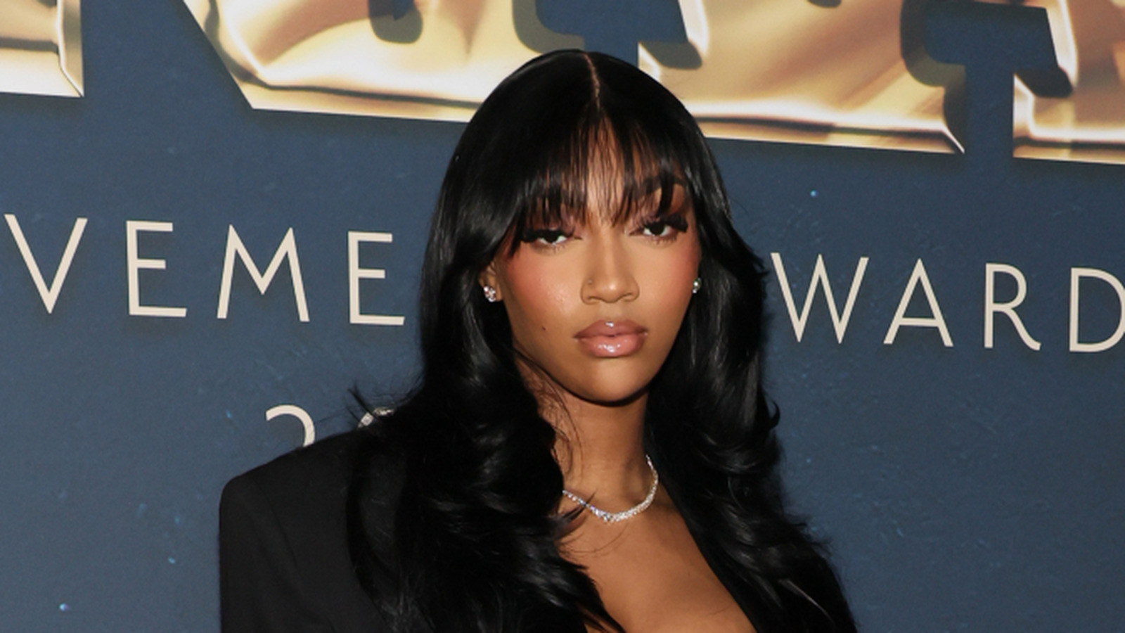 Angel Reese Sports Her Most Revealing Outfit Yet In Very Busty Top