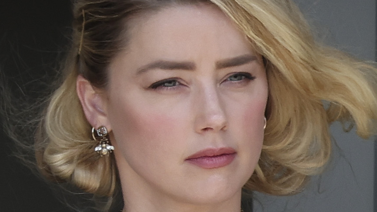Body Language Experts Say Amber Heard's Reaction To Her Legal Loss Is ...