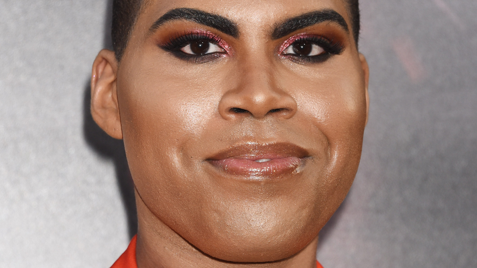 EJ Johnson Stuns In A Silver Gown At An Event Honoring His Famous Dad