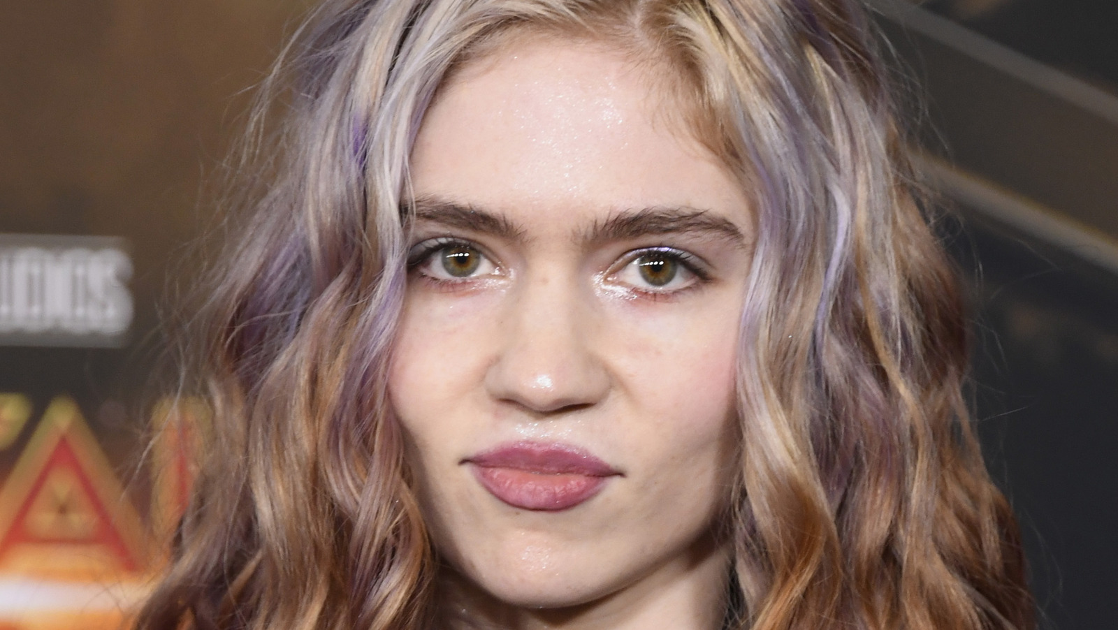 Grimes Completely Rips The 2023 Grammys On Charli XCX's Instagram Post