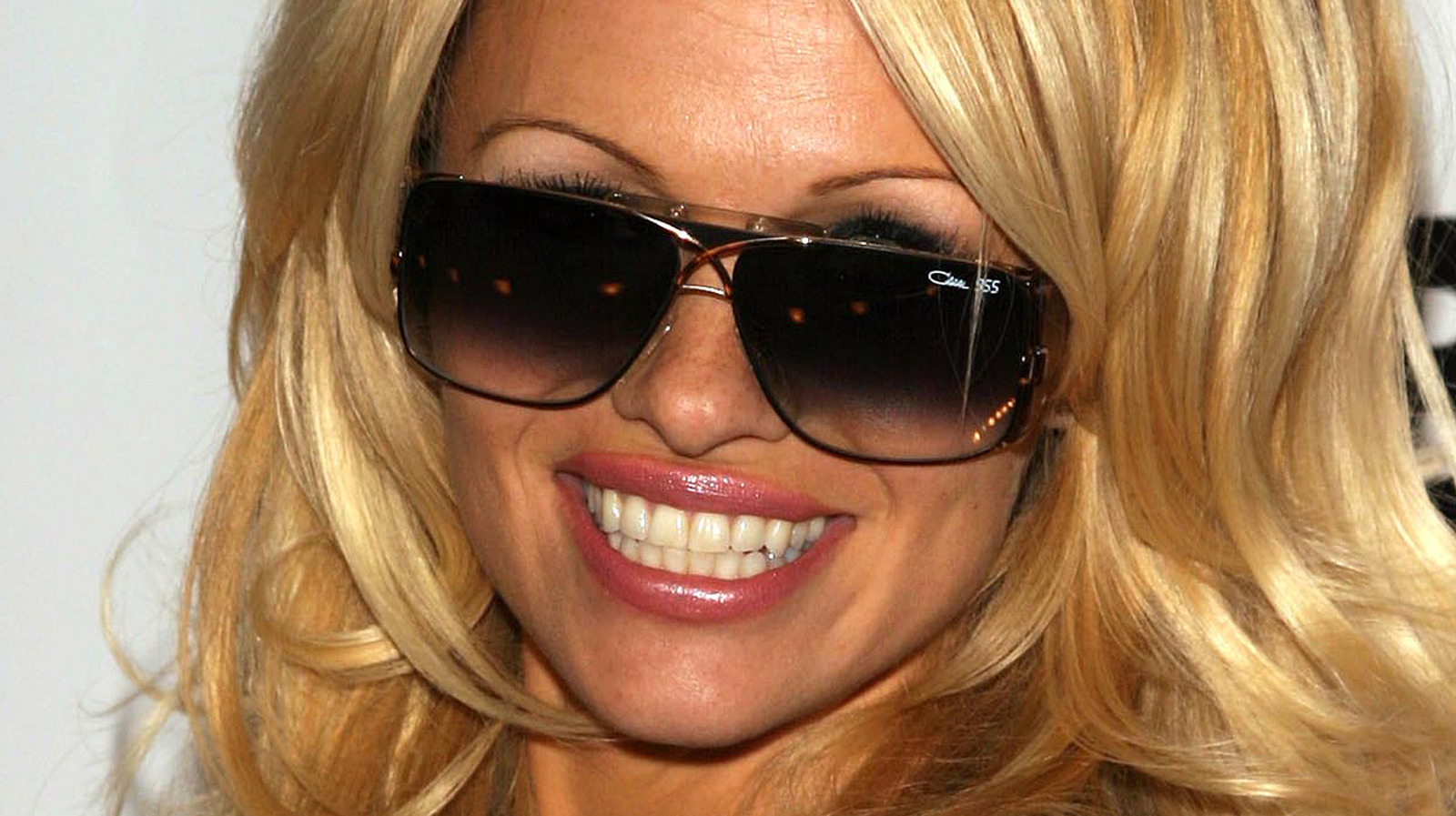 Pamela Anderson's Relationship With Hugh Hefner Was Not What You Might ...