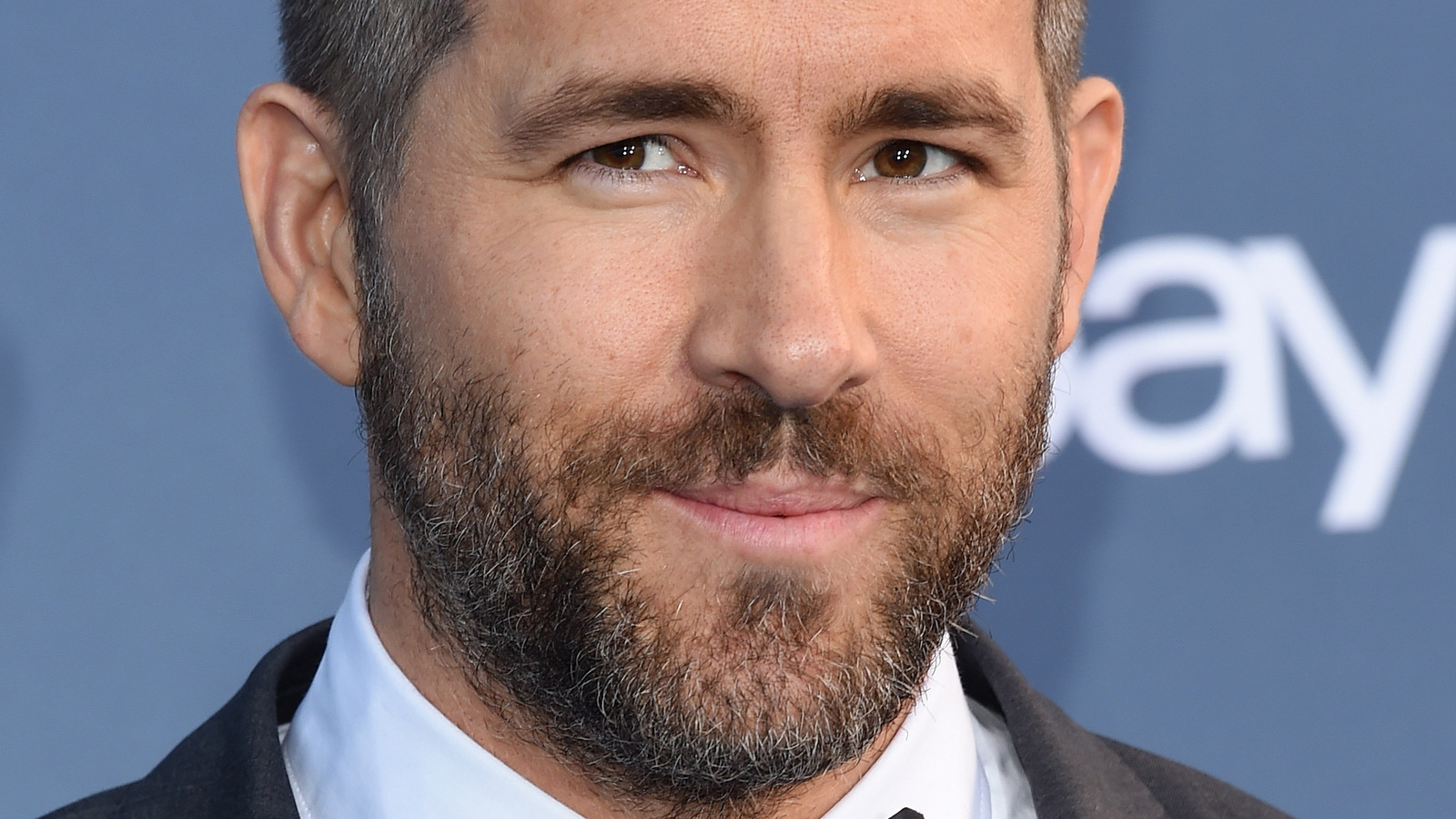 The Sad Reason Ryan Reynolds Takes On Too Much Work
