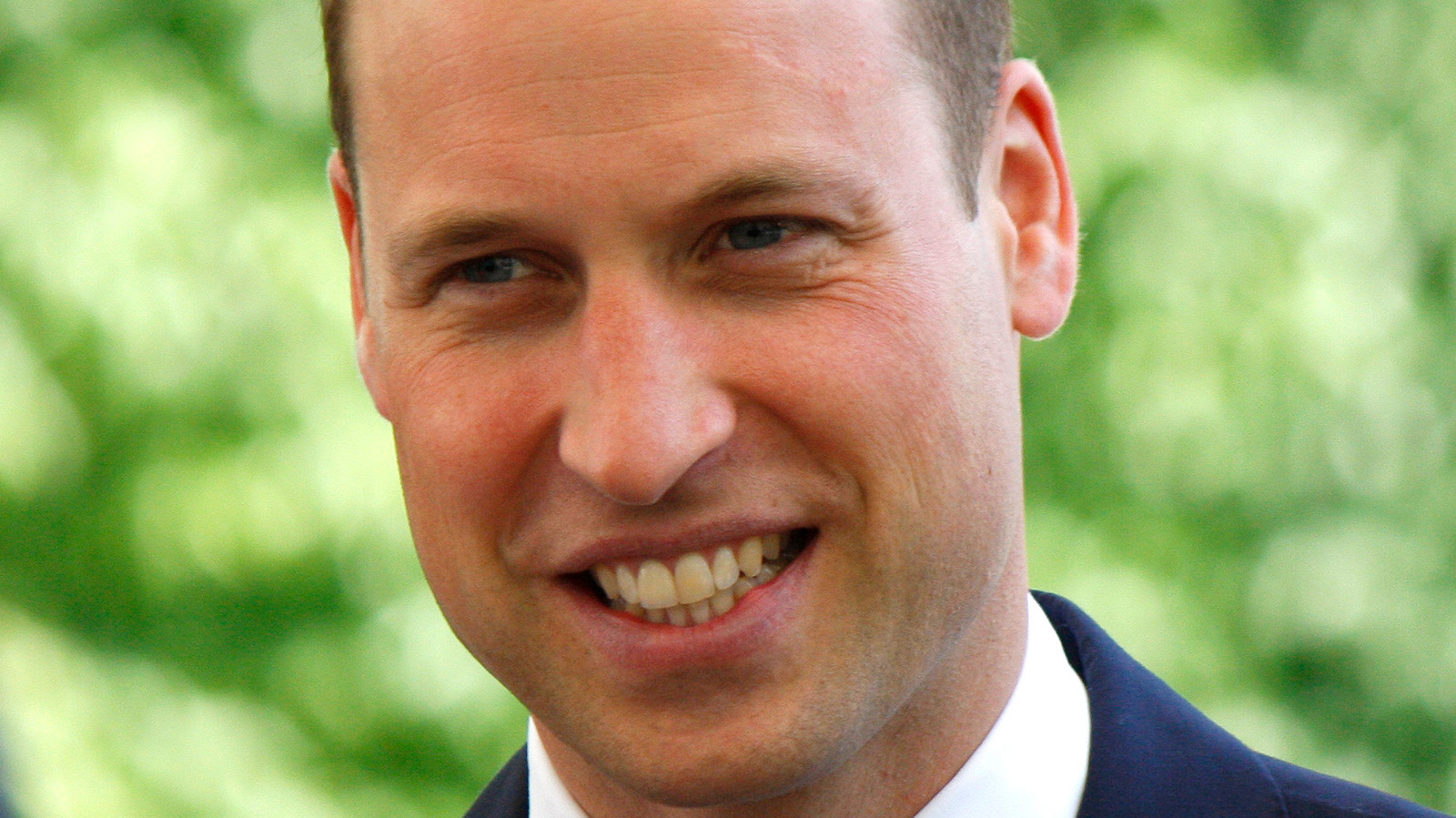What Photos Are On Display In Prince William's Office?